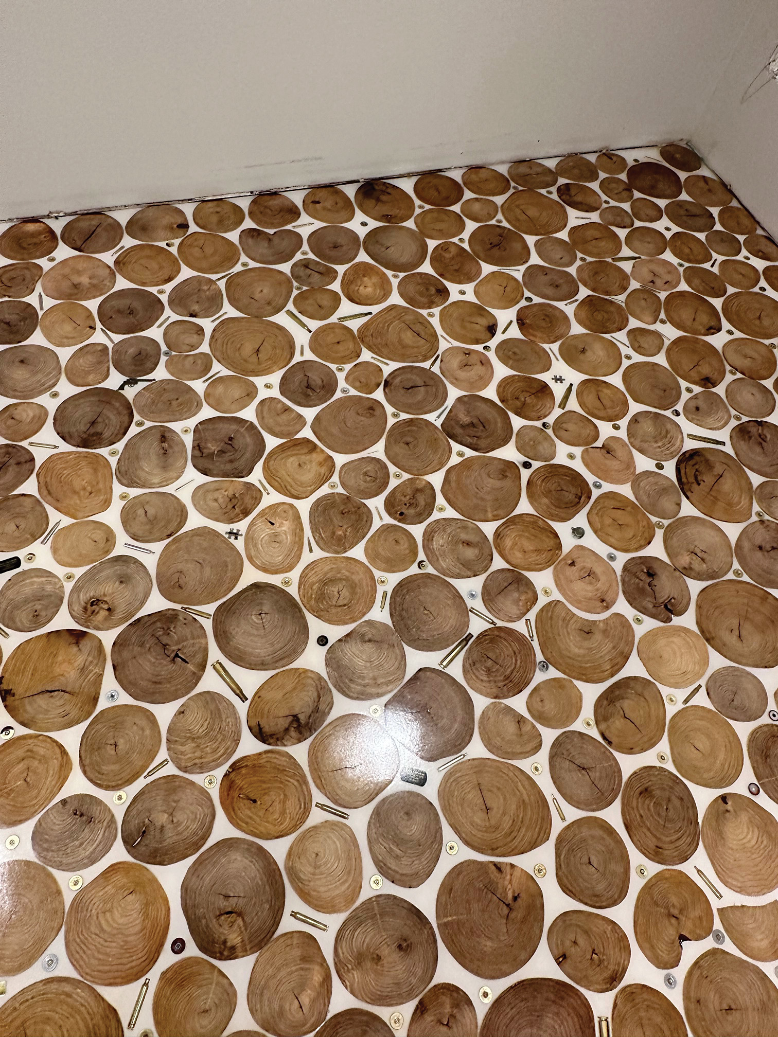 Log Rounds Are a Bullseye for Outdoorsman’s Floor | Wood Floor Business