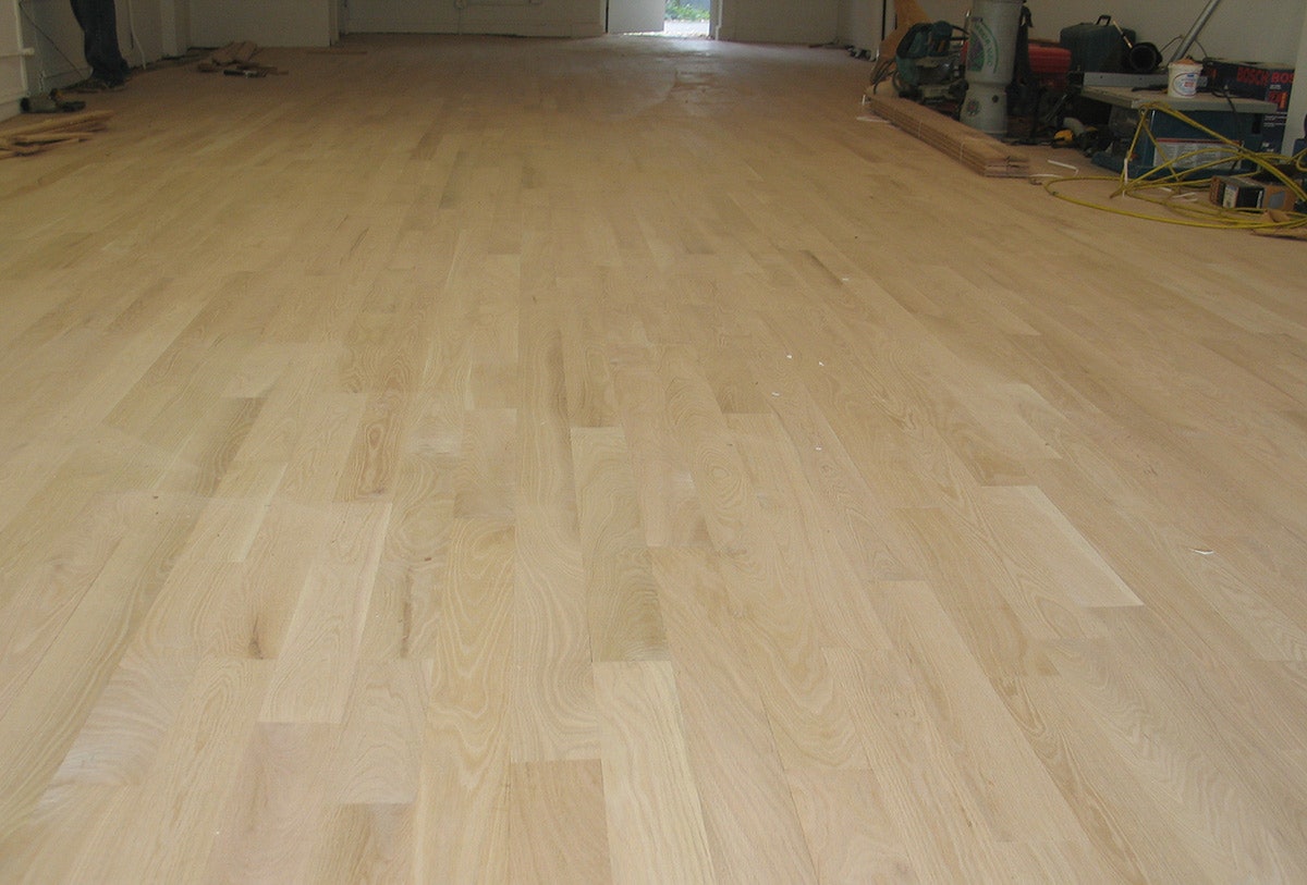 Step by Step: Fixing an Uneven Wood Subfloor Before Wood Floors | Wood ...